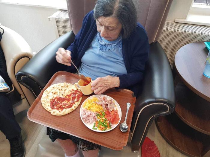 Pizza Party Fun: Residents Craft Homemade Pizzas for Tea Time Delights ...